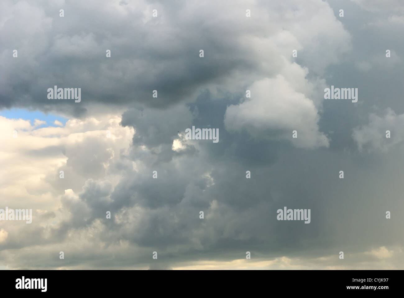 Cloudy sky full of deep grey thunder clouds on the sunset Stock Photo ...