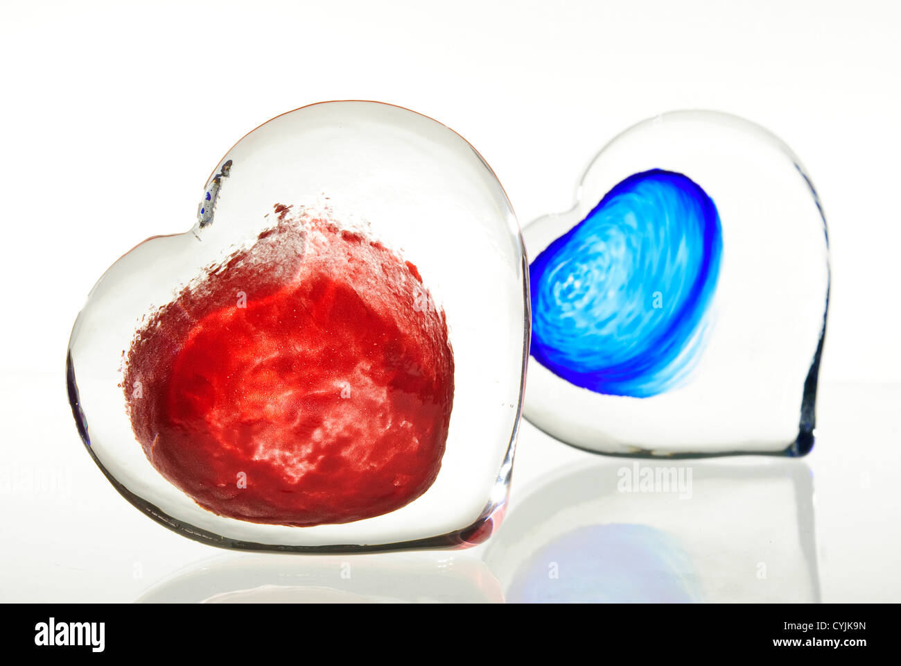 Two colored crystal hearts Stock Photo - Alamy
