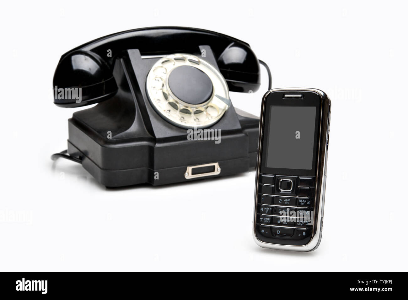 Retro classics and modern cellular phones isolated over white ...