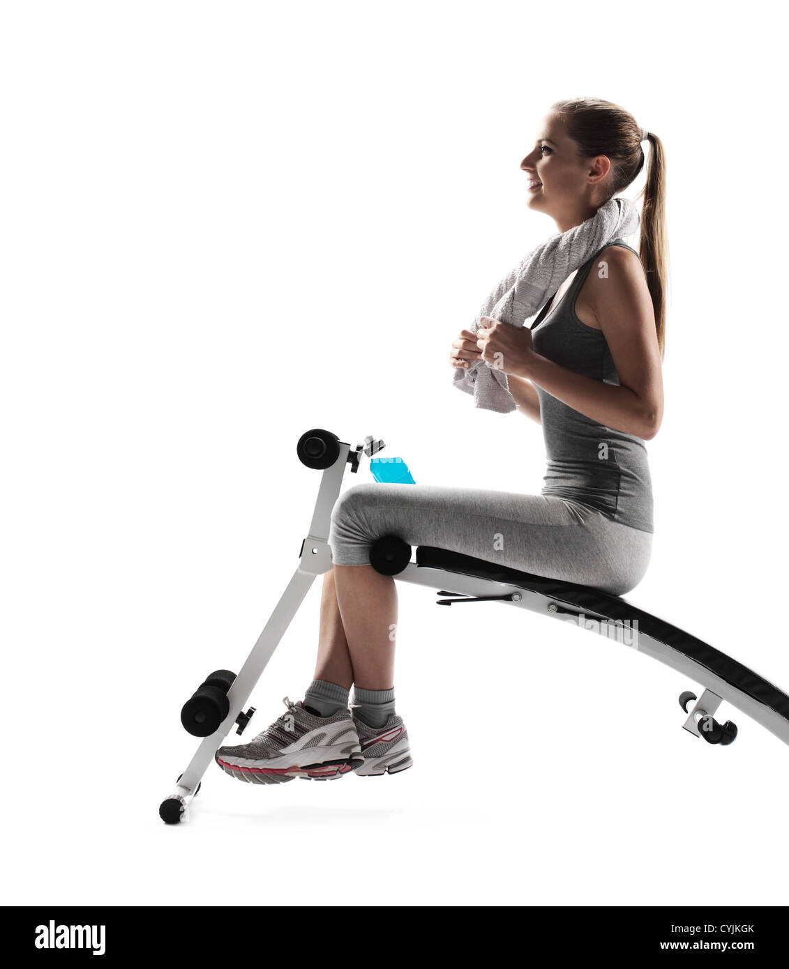 Young woman resting after exercising Stock Photo - Alamy