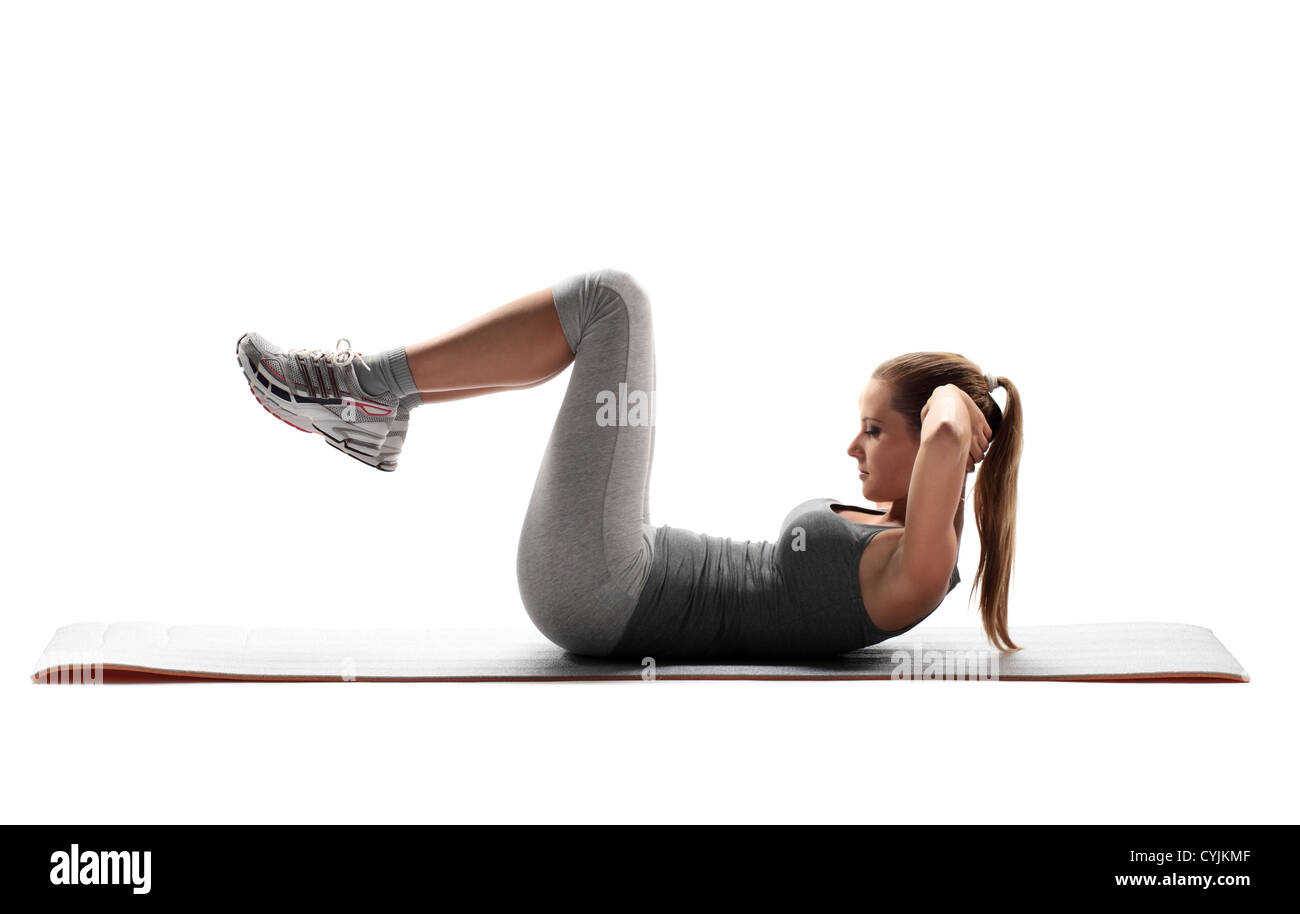 Portrait of a young healthy woman fitness abdominal exercises Stock ...