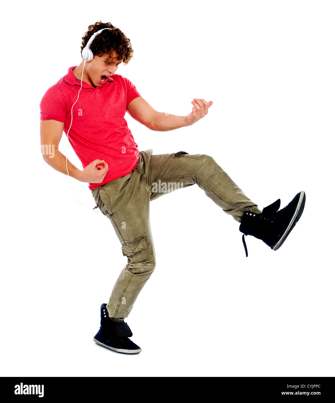 Handsome trendy guy enjoying music via headphones Stock Photo - Alamy