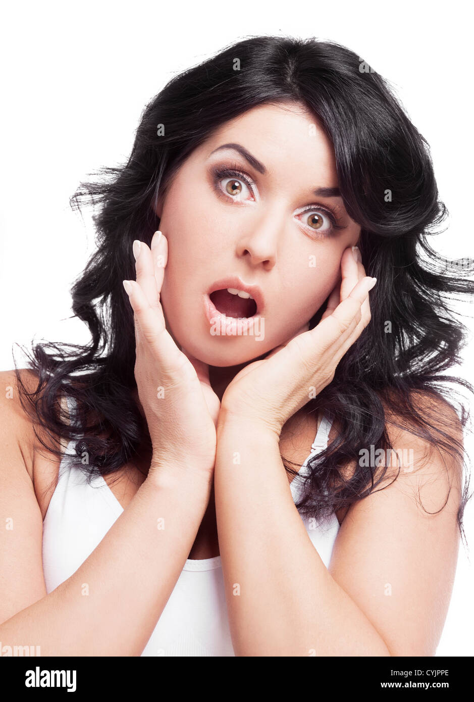 portrait of a beautiful young surprised woman, isolated on white ...