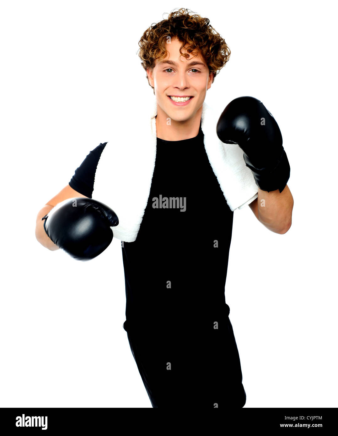Handsome boxer posing with boxing gloves against white background Stock ...