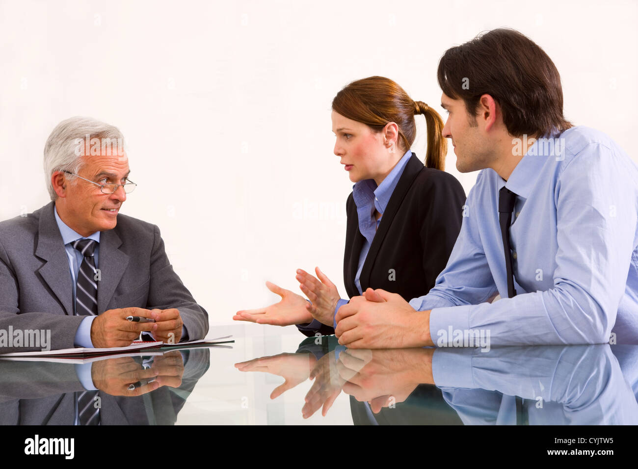 two men and one woman during a job interview Stock Photo - Alamy