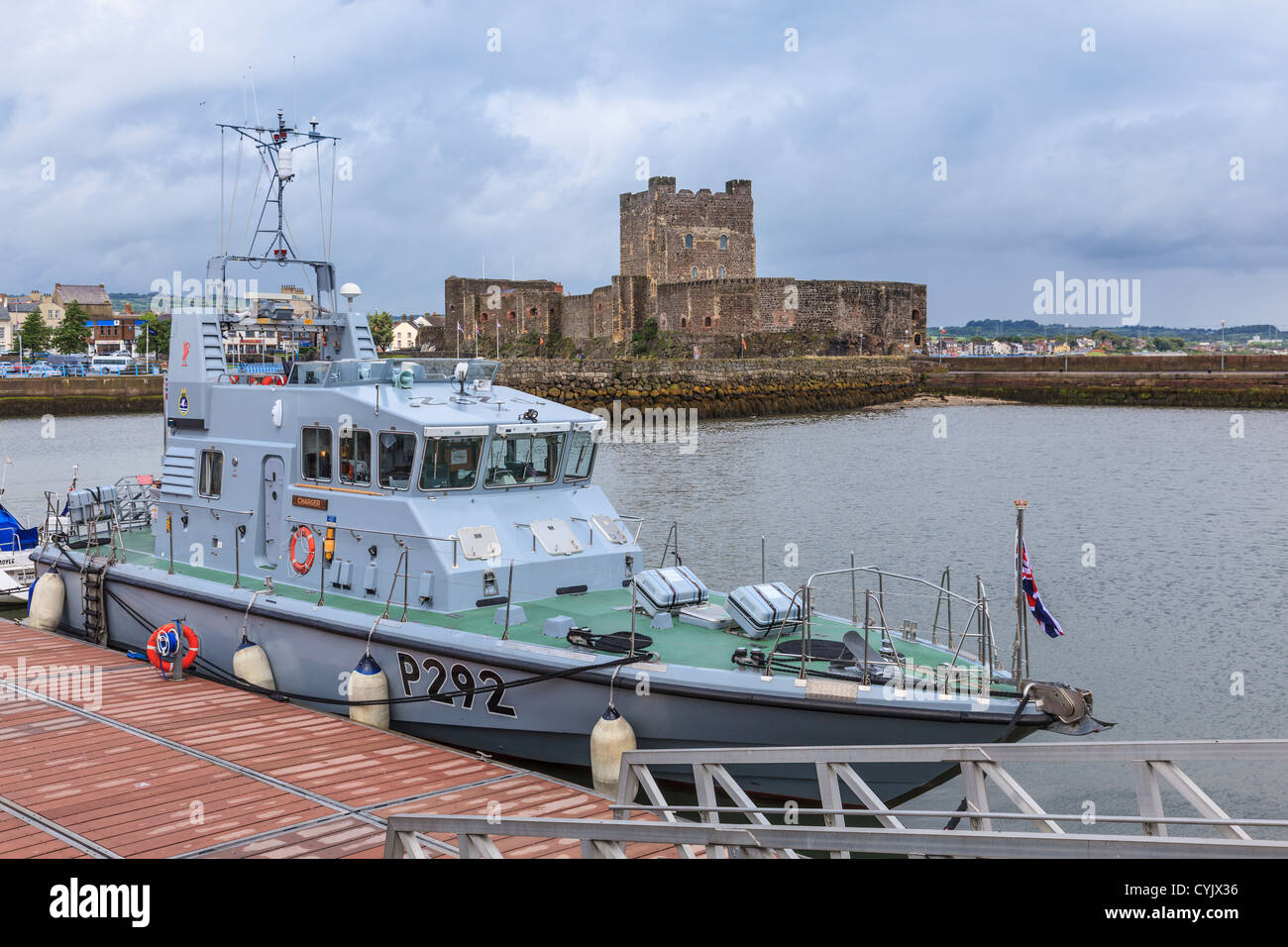 HMS Charger (P292) in front of Carrickfergus Castle Stock Photo - Alamy