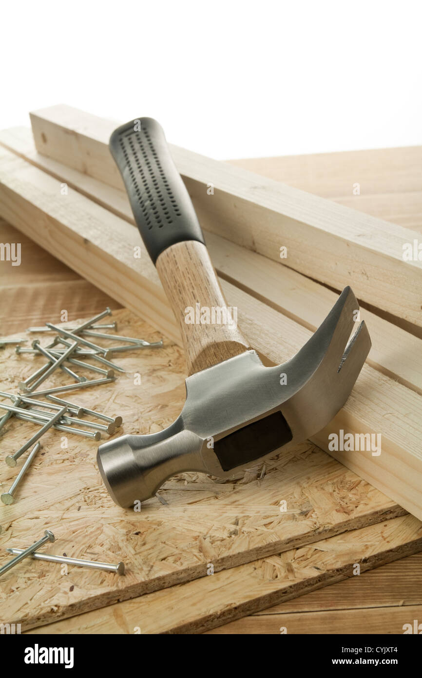 Wooden planks, hammer and nails Stock Photo - Alamy