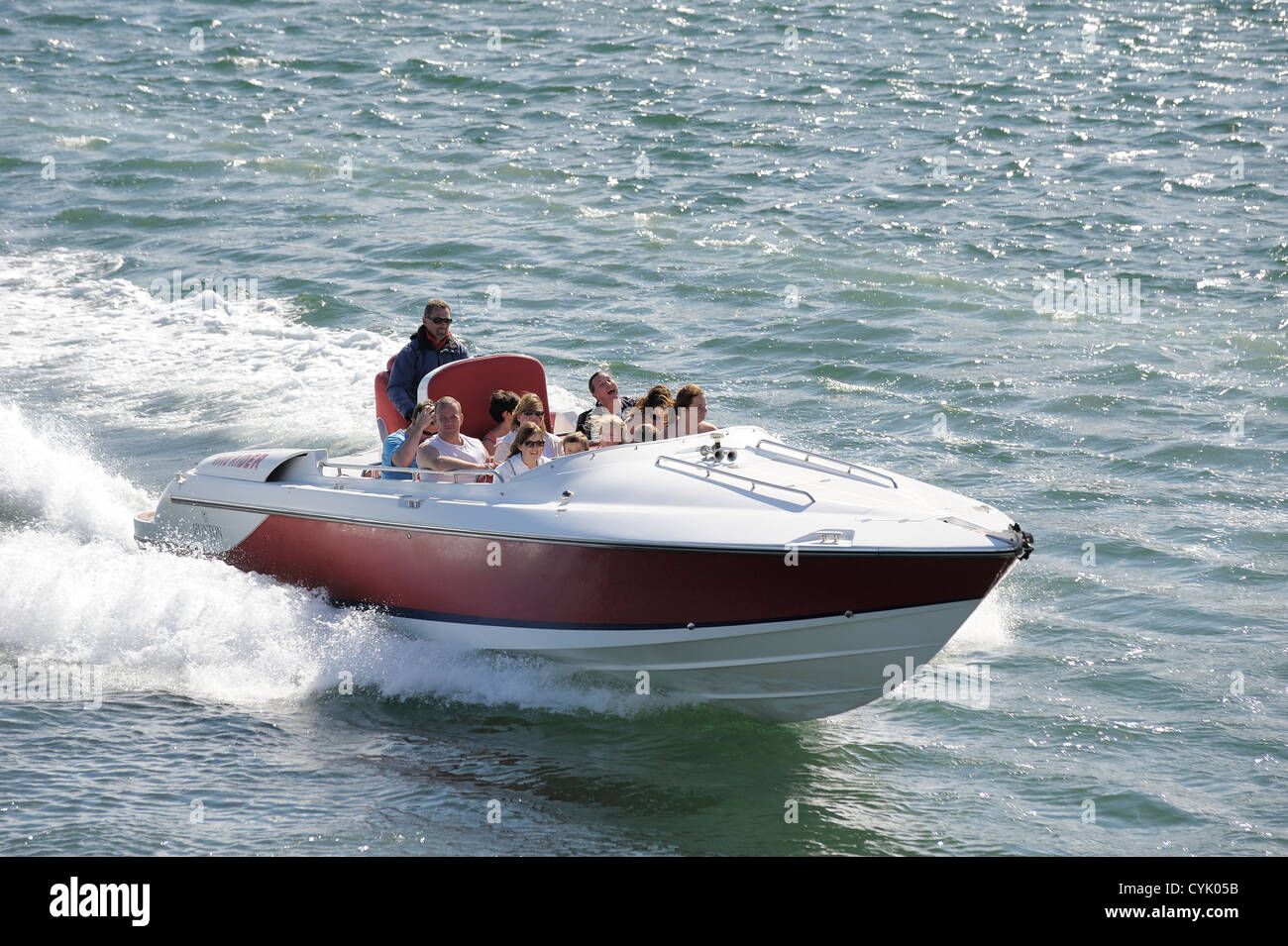 speedboat moving at speed across the bay in Scarborough england uk ...
