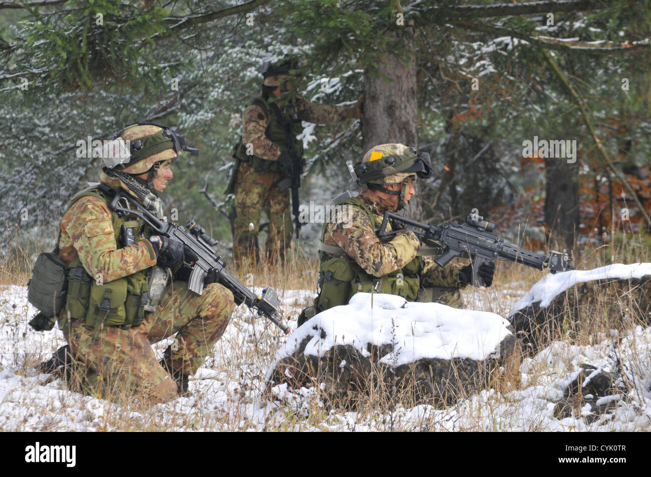 Italian soldiers from the 183rd Airborne Regiment provide security ...