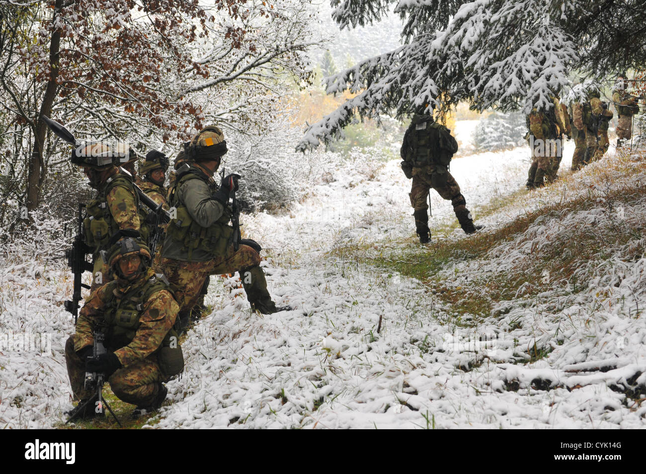 Italian soldiers from the 183rd Airborne Regiment pause during the ...