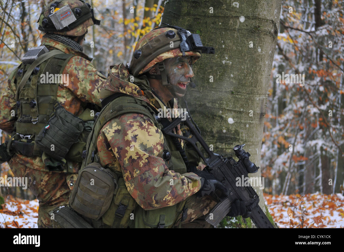 An Italian soldier from the 183rd Airborne Regiment issues commands ...
