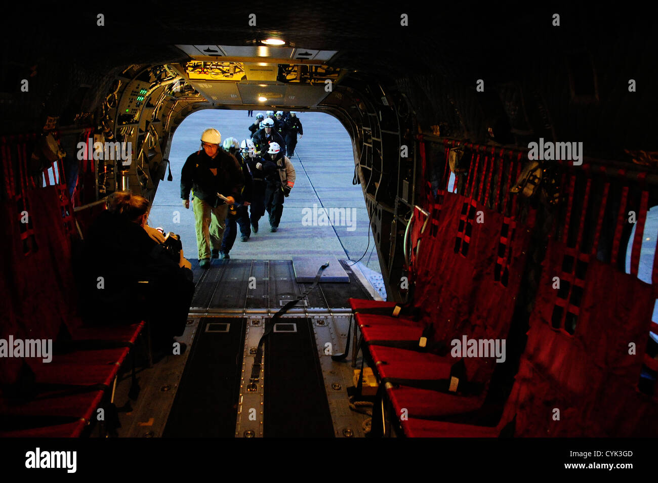 Members of Maryland Urban Search and Rescue Task Force one fly aboard a ...
