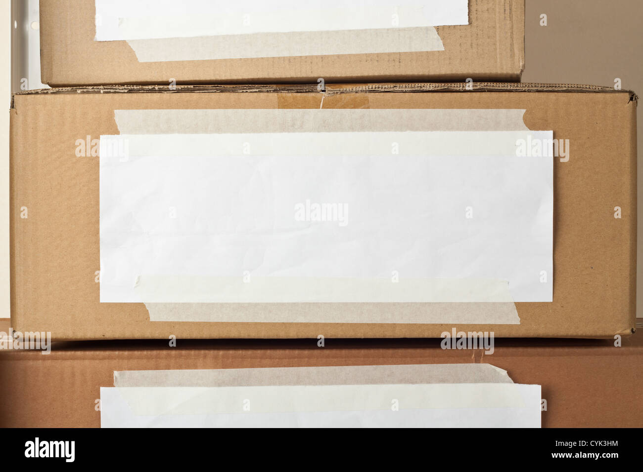 Cardboard boxes with blank labels. Moving, storage concept Stock Photo ...