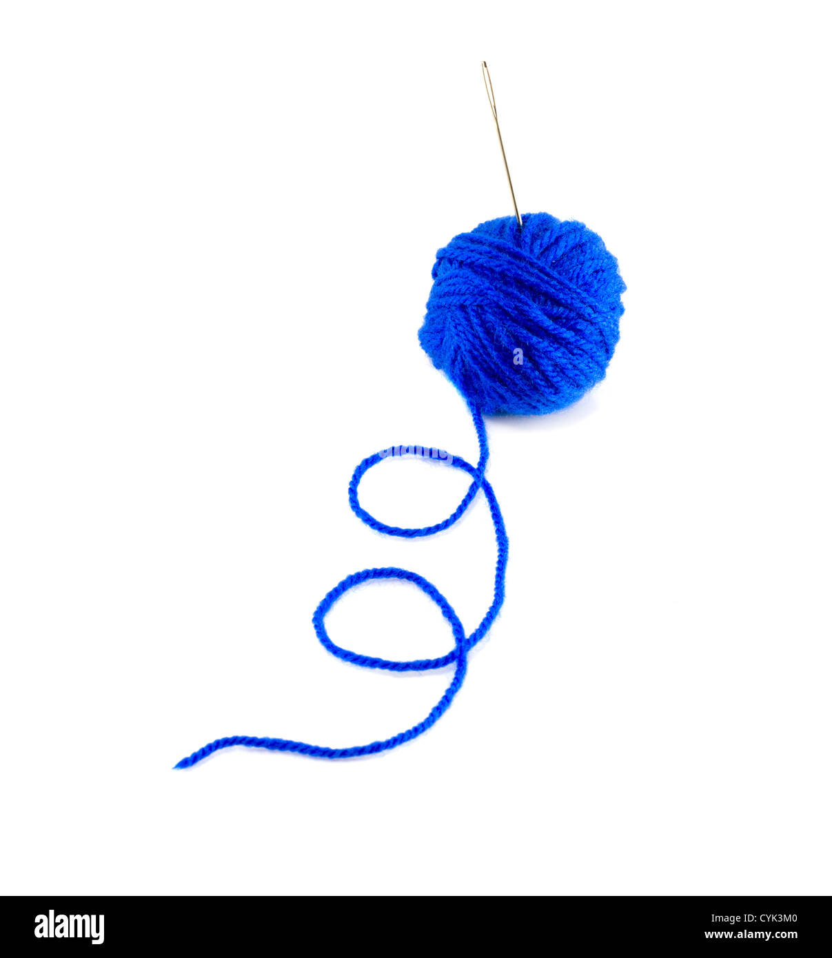 ball of blue wool and metal needle Stock Photo - Alamy