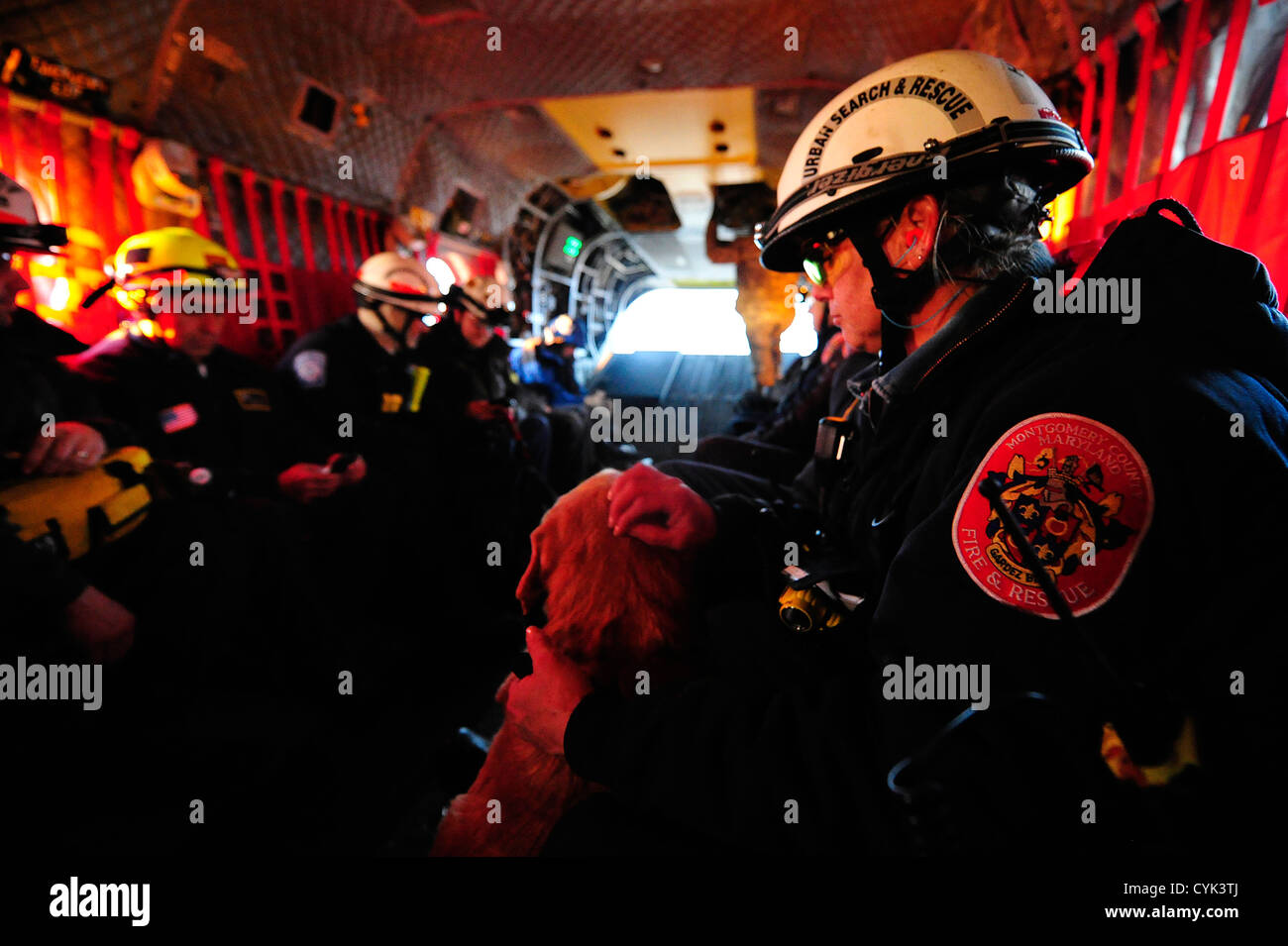 Members of the Maryland Urban Search and Rescue Task Force use a U.S ...