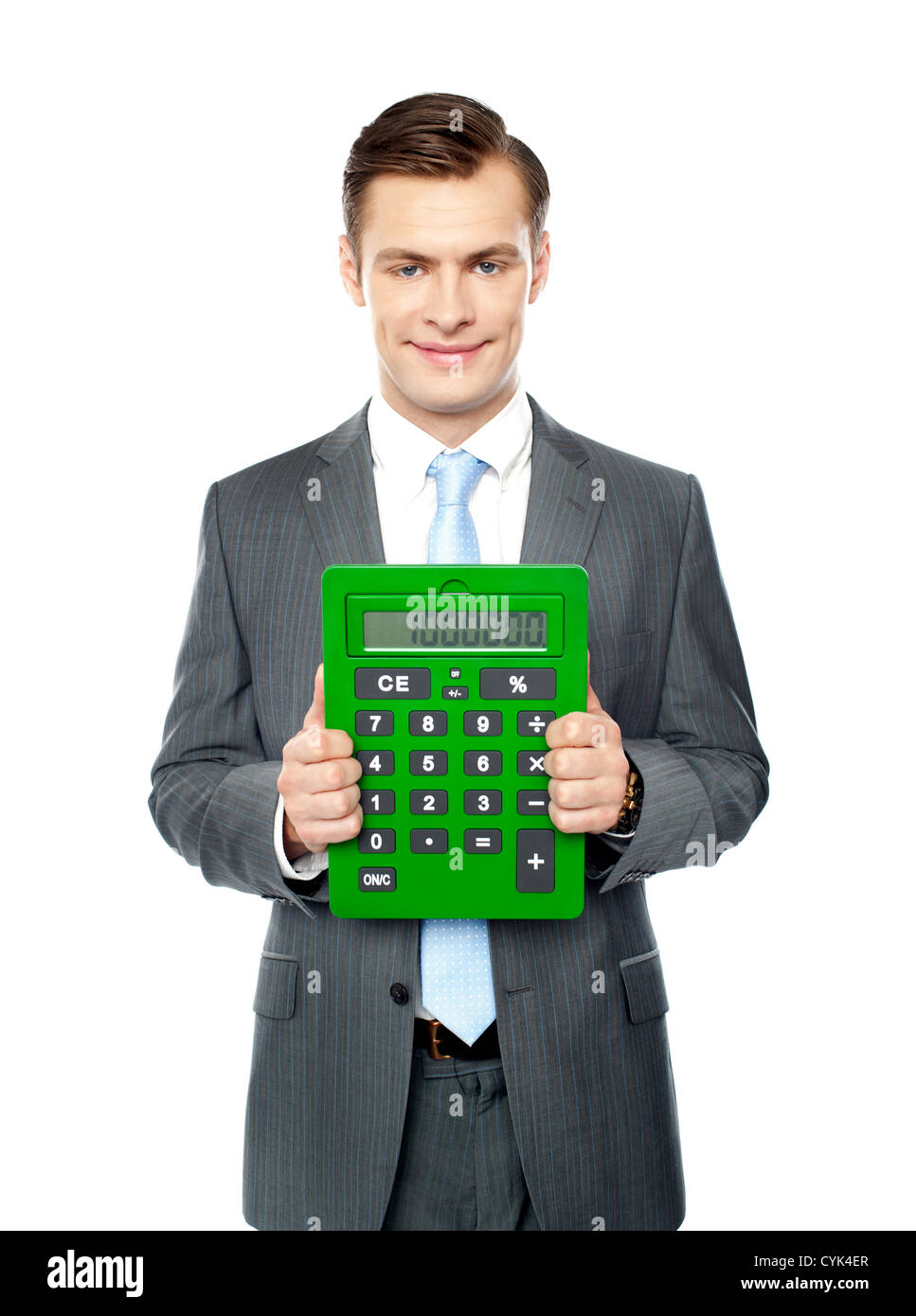 Corporate man showing big green calculator standing over white ...