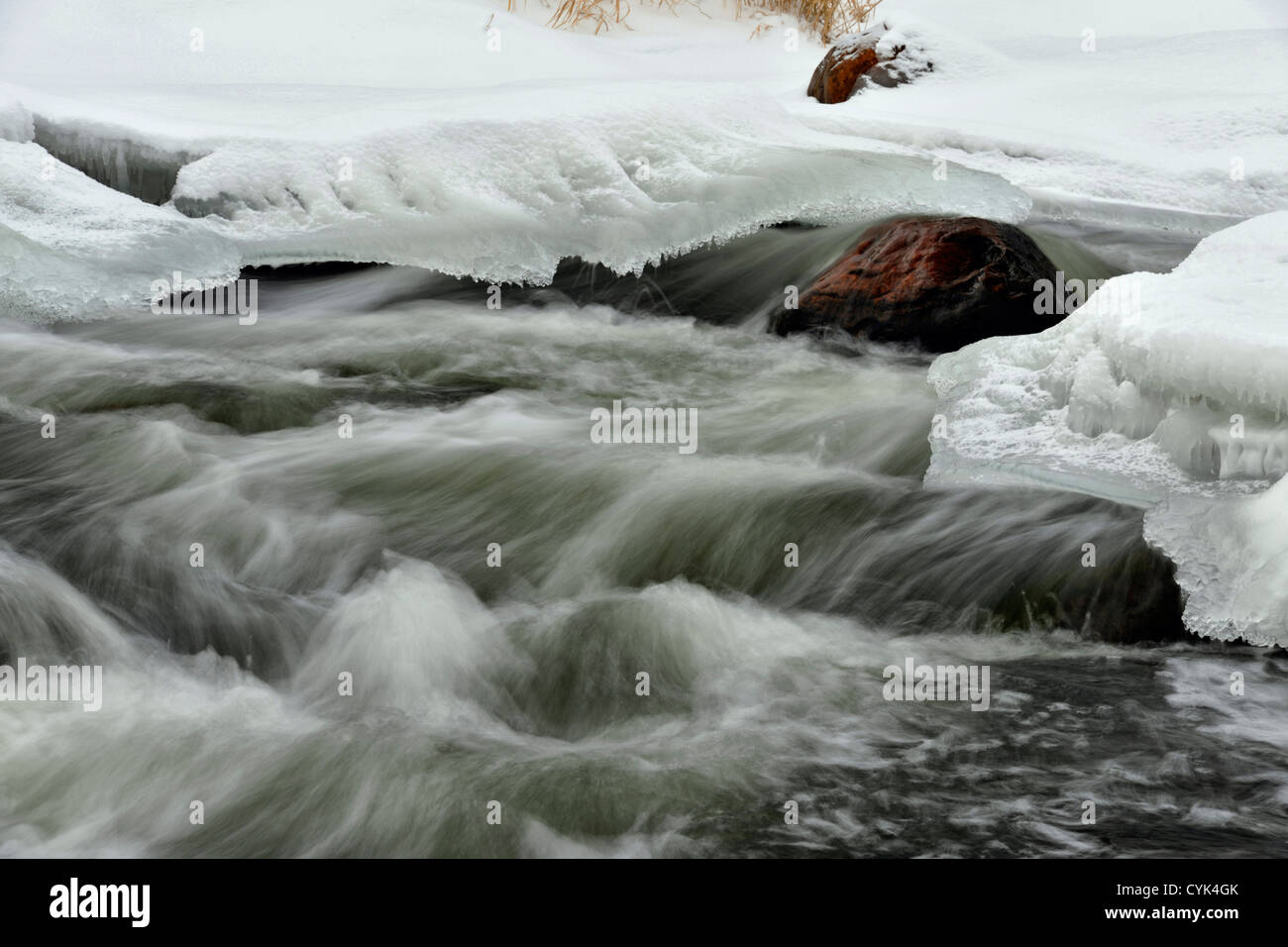 Junction Creek rapids with snow and shoreline ice, Greater Sudbury ...