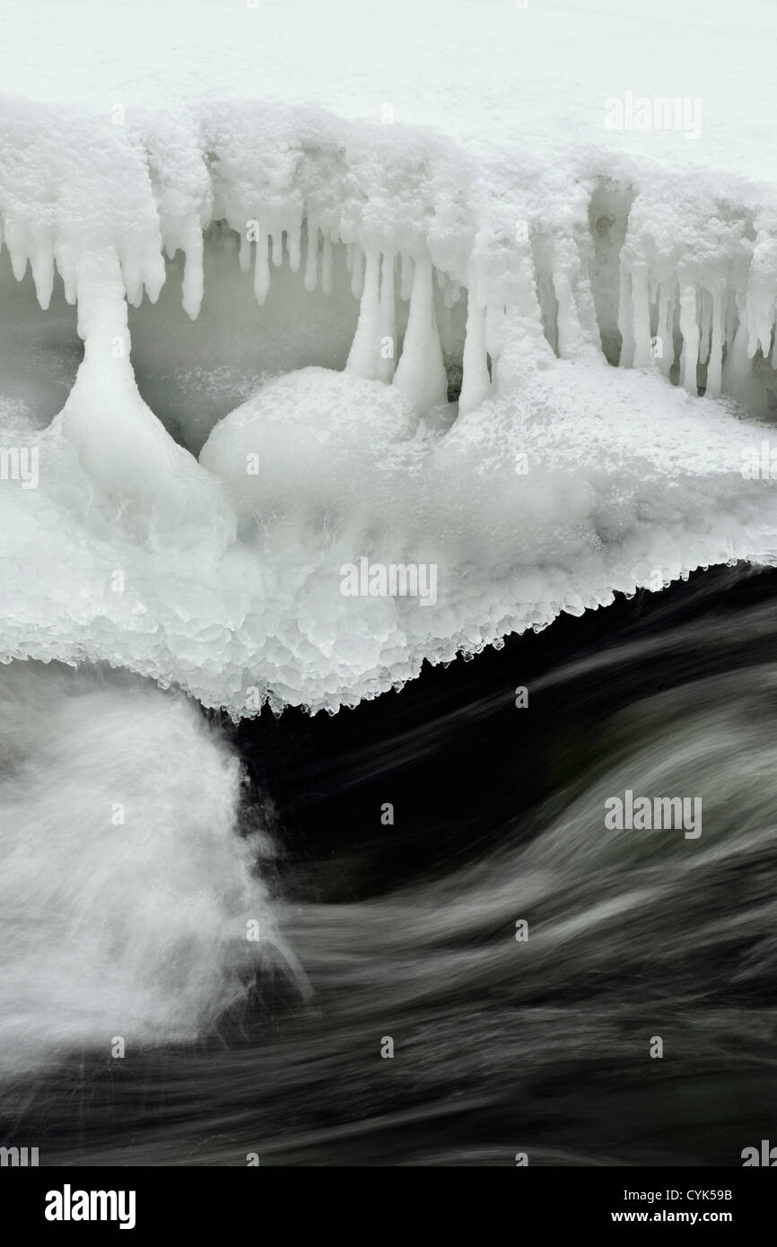 Junction Creek rapids with snow and shoreline ice, Greater Sudbury ...