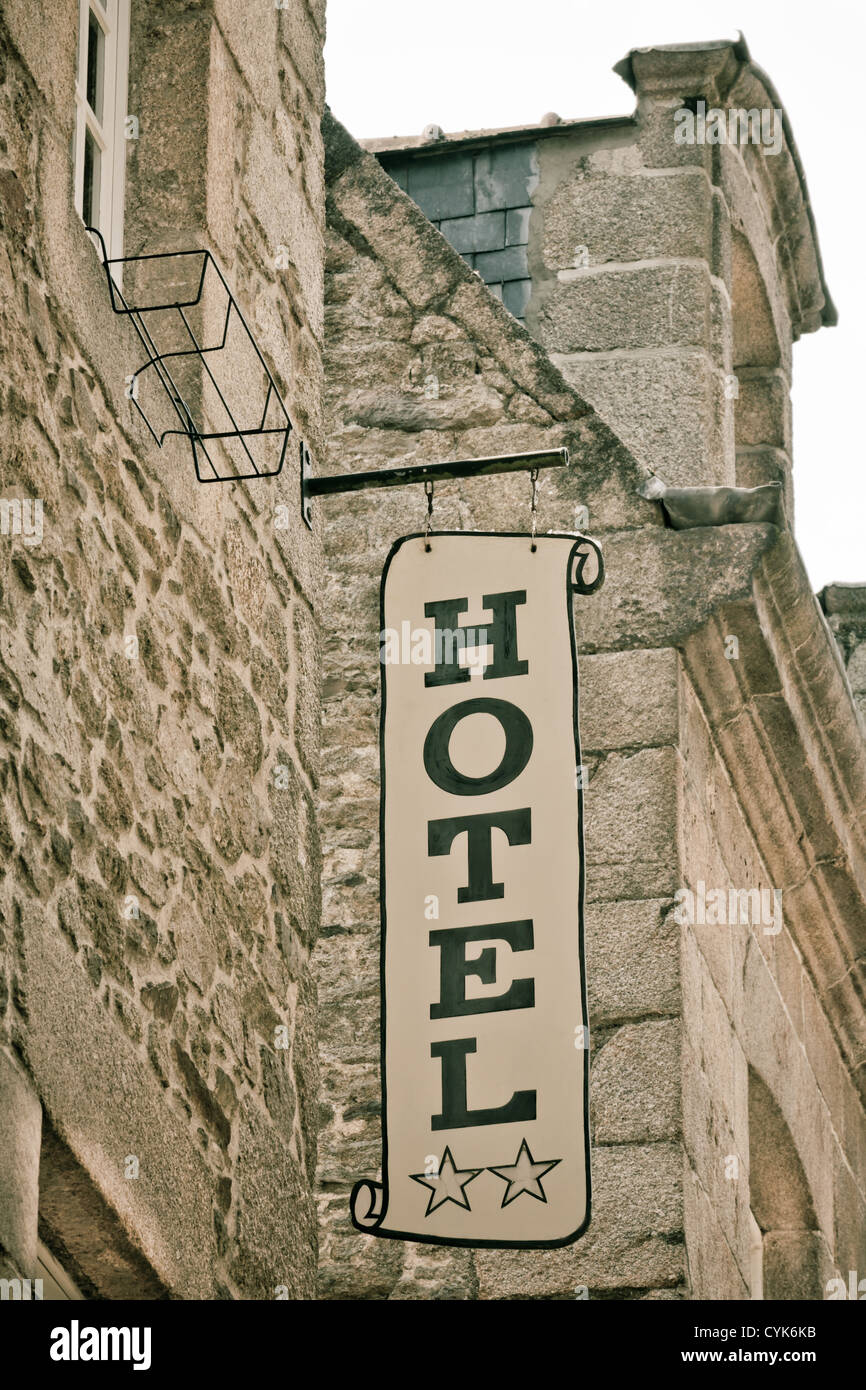 Hotel Sign on Old Stone Building in France. Toned image Stock Photo - Alamy