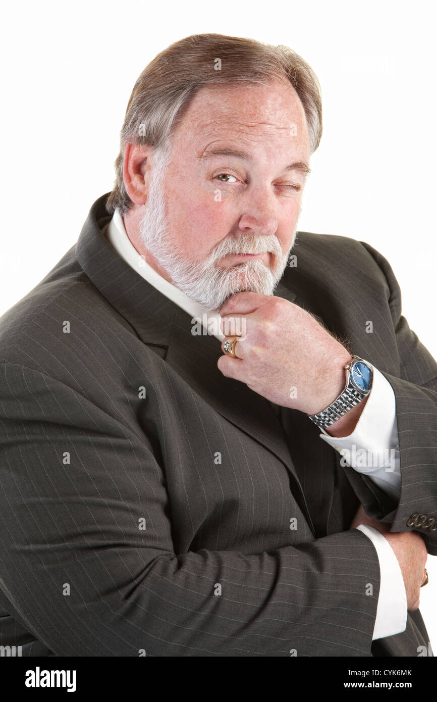 Easygoing mature man with beard over white background Stock Photo - Alamy