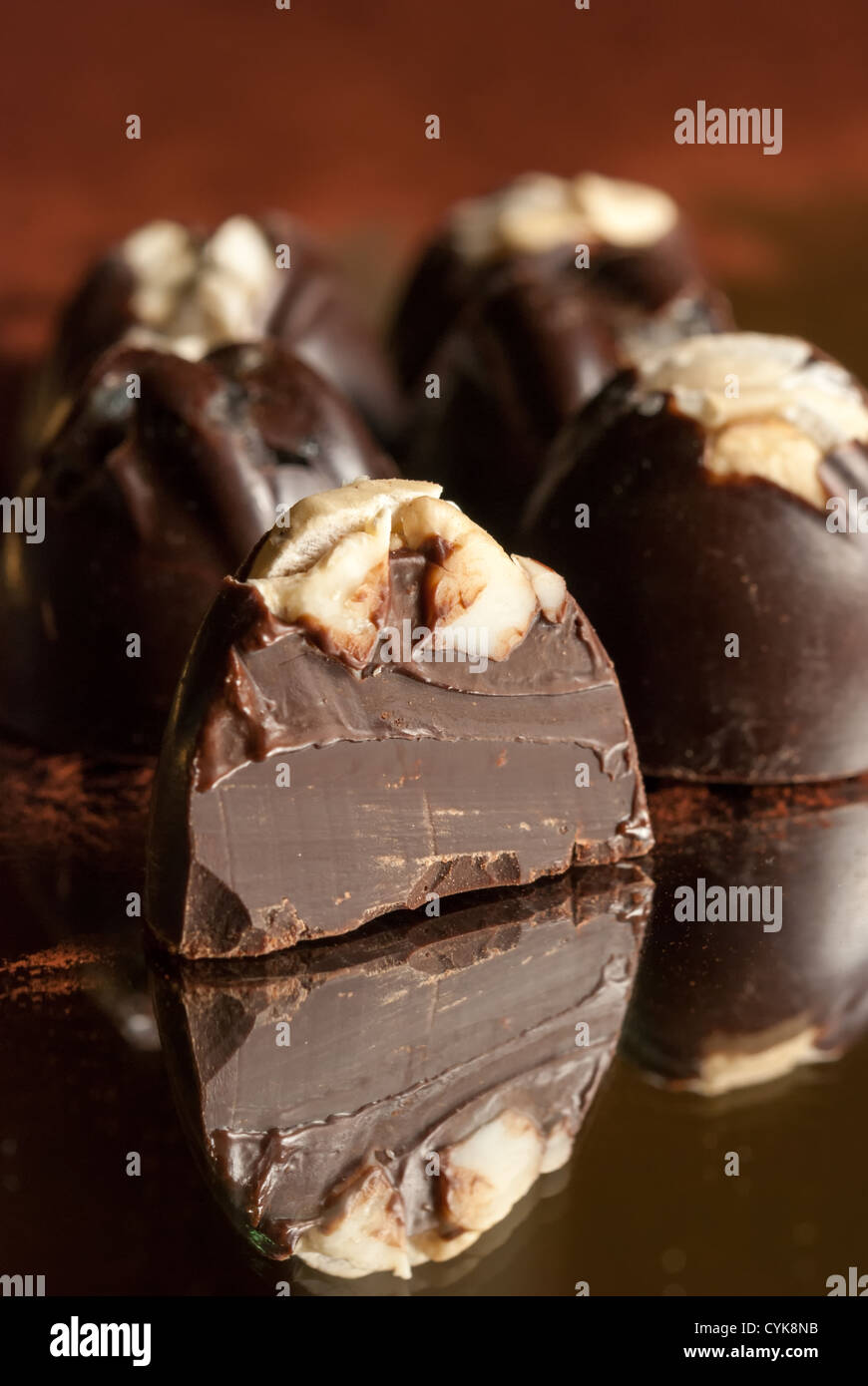 Luxury handmade black chocolate candy with stick Stock Photo - Alamy