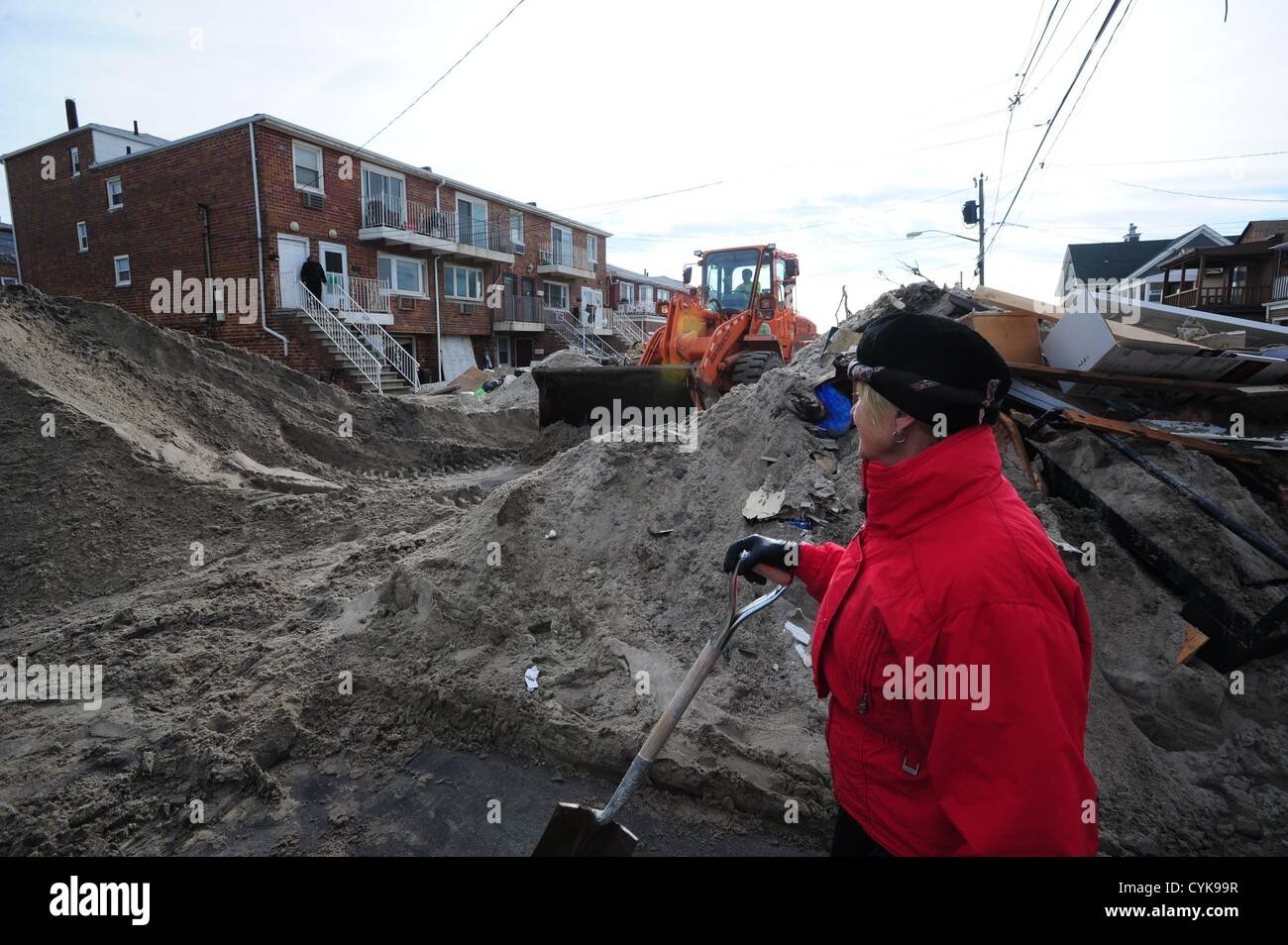 Nov. 6, 2012 - Queens, New York, U.S. - Susan Corbin looks on as a DOT ...