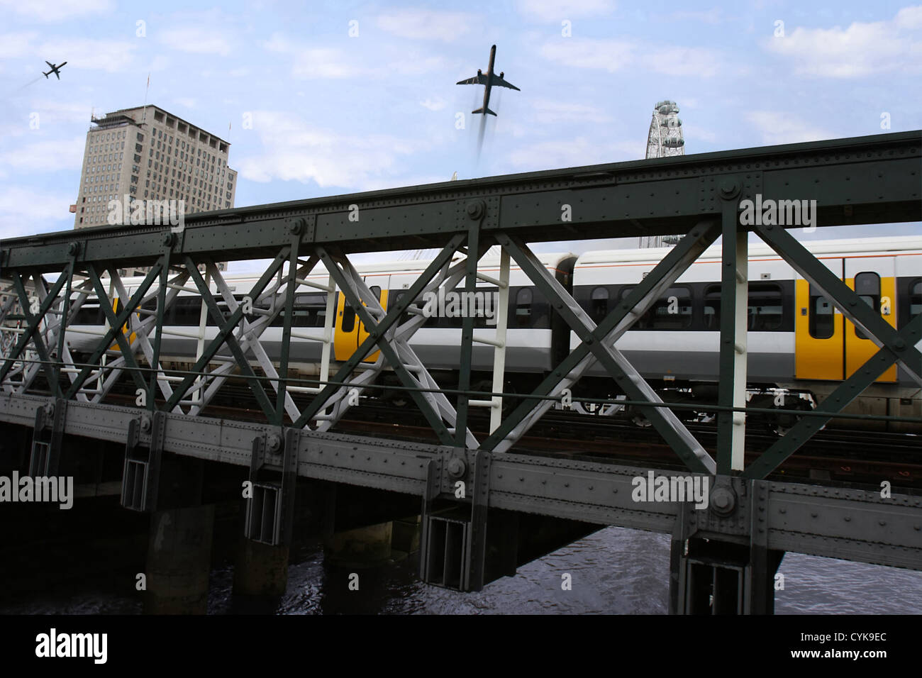 train and planes passing over a bridge in london city Stock Photo - Alamy