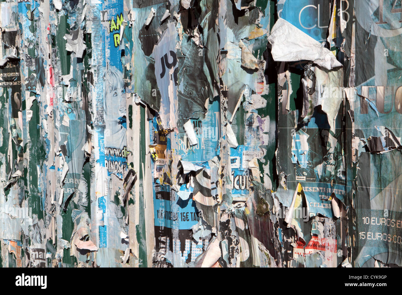 Detail showing texture of torn advertising billboard posters on ...
