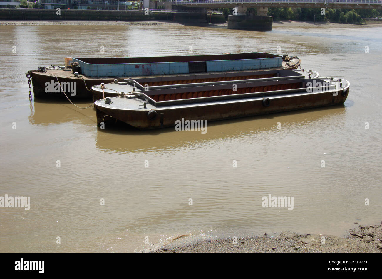 Barges on the Thames below Chelsea Bridge in London, England Stock ...