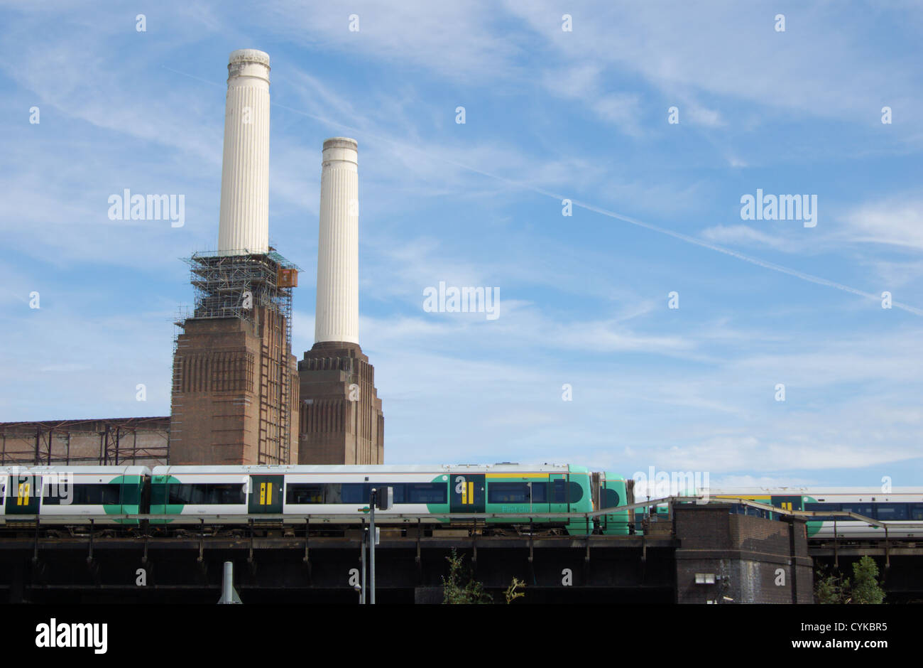 battersea power station and commuter trains in London, England Stock ...