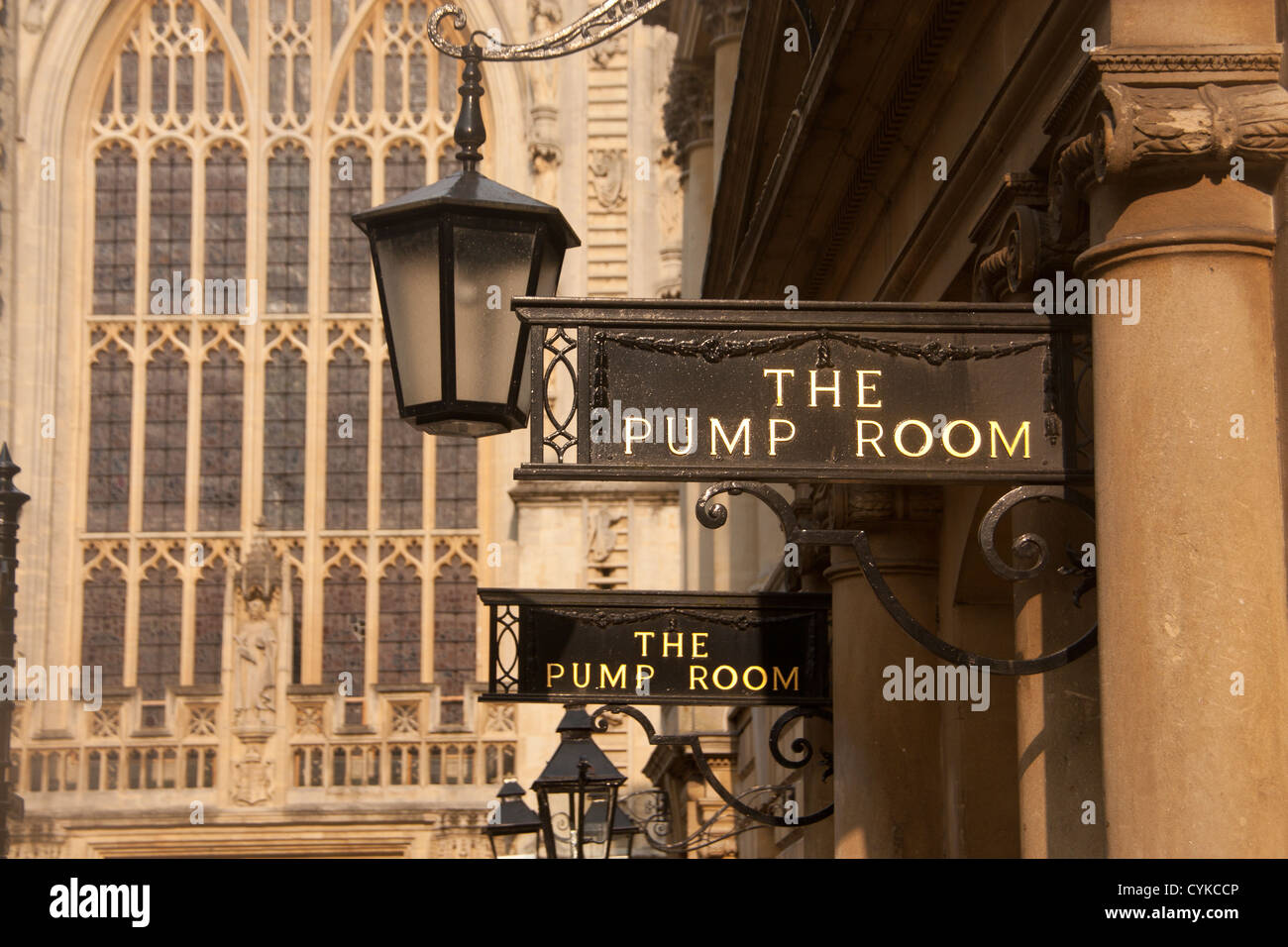 Pump Room signs with west window of Abbey church in background Bath ...