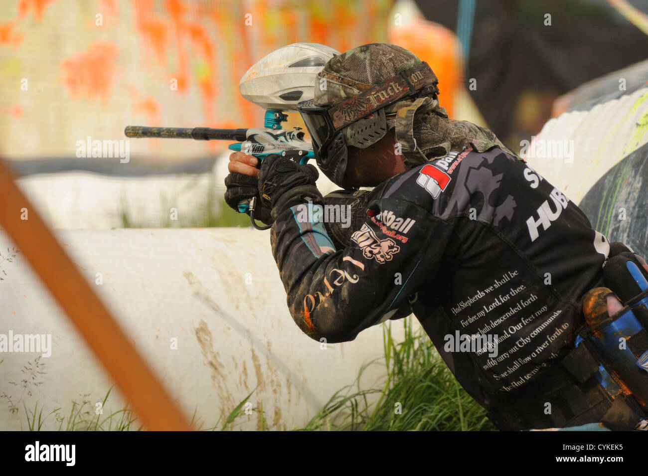 Paintball player shooting Stock Photo - Alamy