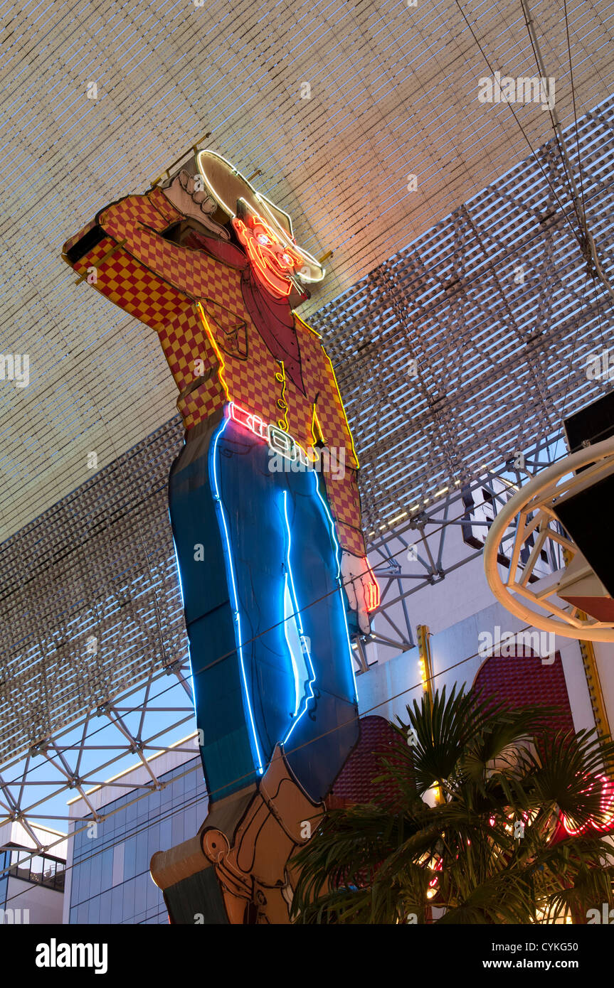 Famous neon cowboy at the Pioneer Club, nighttime at the Fremont Street ...