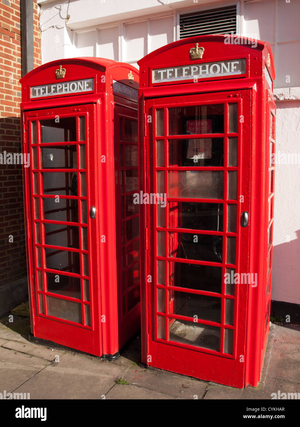Twin red K6 kiosk telephone boxes designed by Sir Giles Gilbert Scott, North Street, Guildford ...