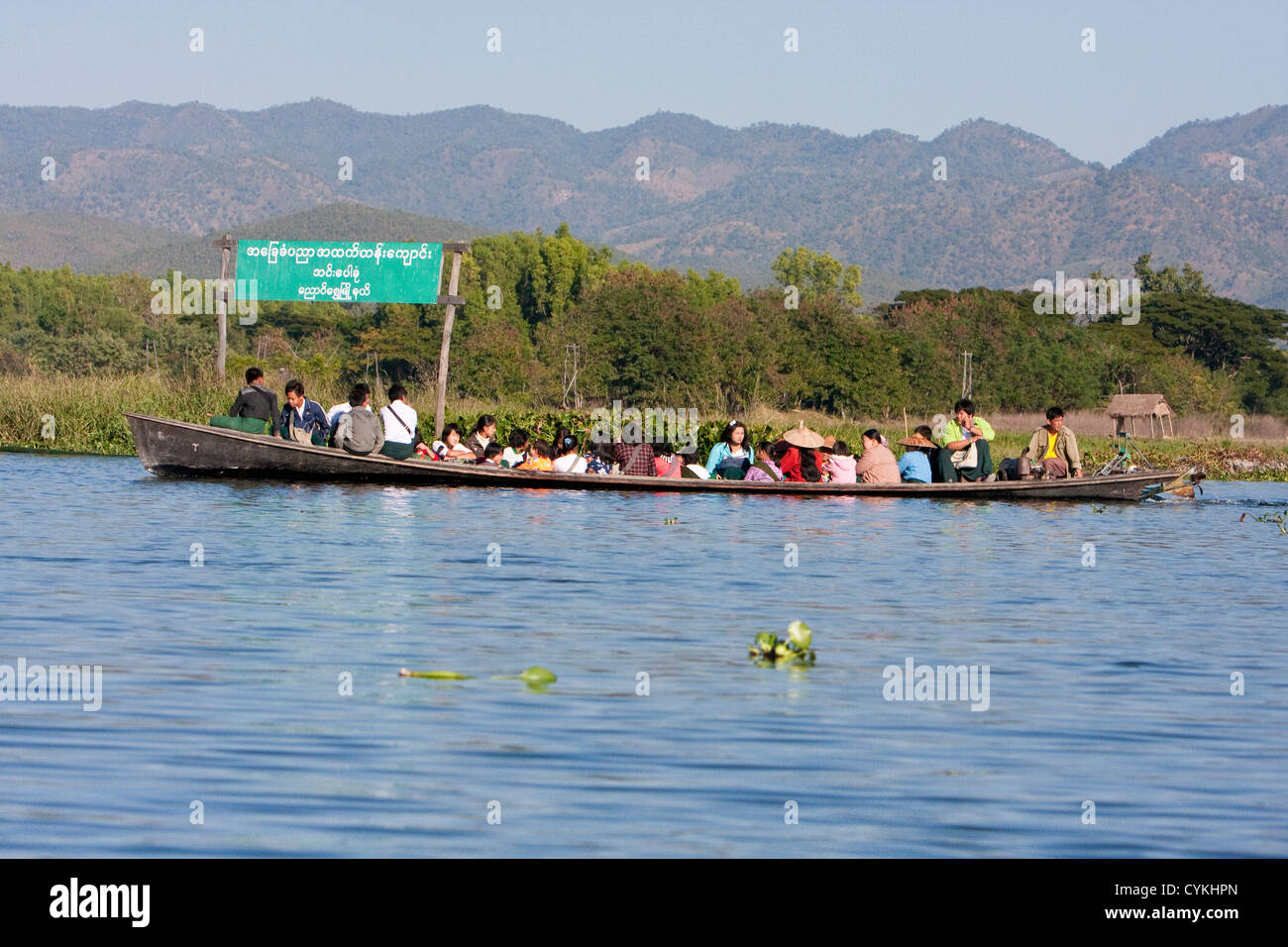 Myanmar, Burma. School Children Riding Home after School, Inle Lake ...