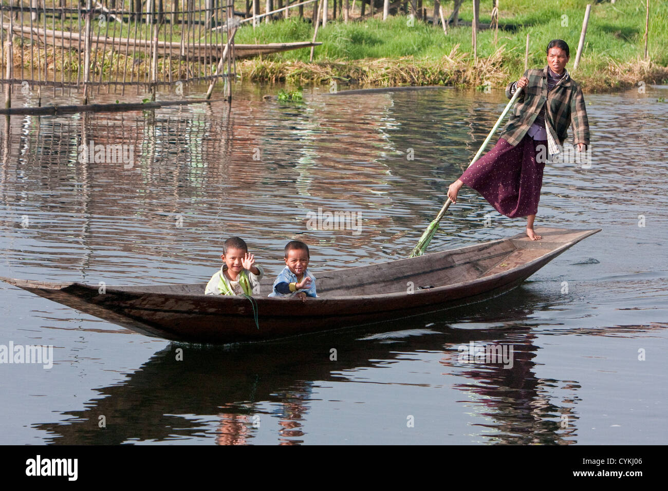 Myanmar, Burma. Burmese Man of Intha Ethnic Group Rowing Canoe in One ...