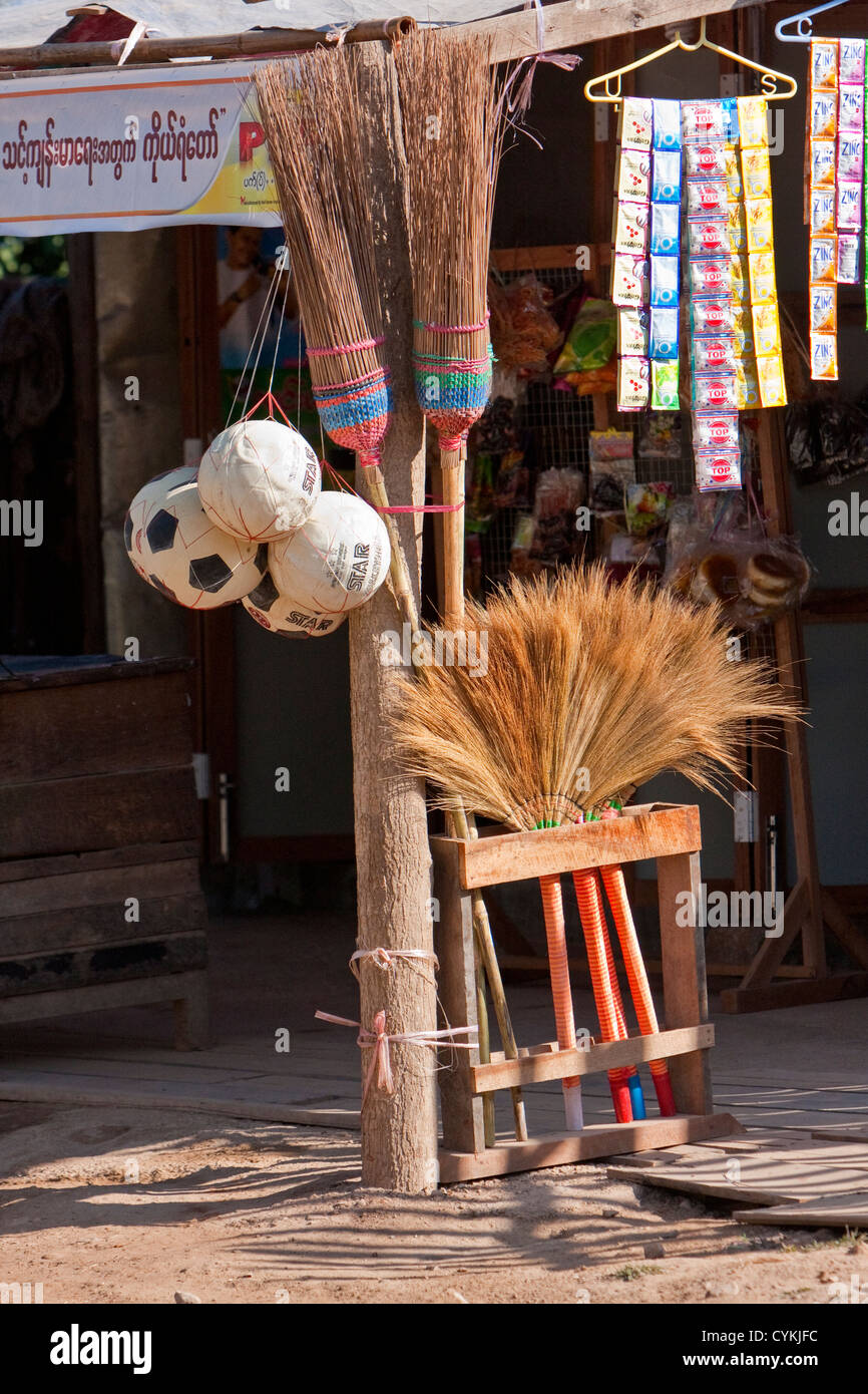 Myanmar, Burma. Soccer Balls and Brooms for Sale, Streetside Shop, Inle ...