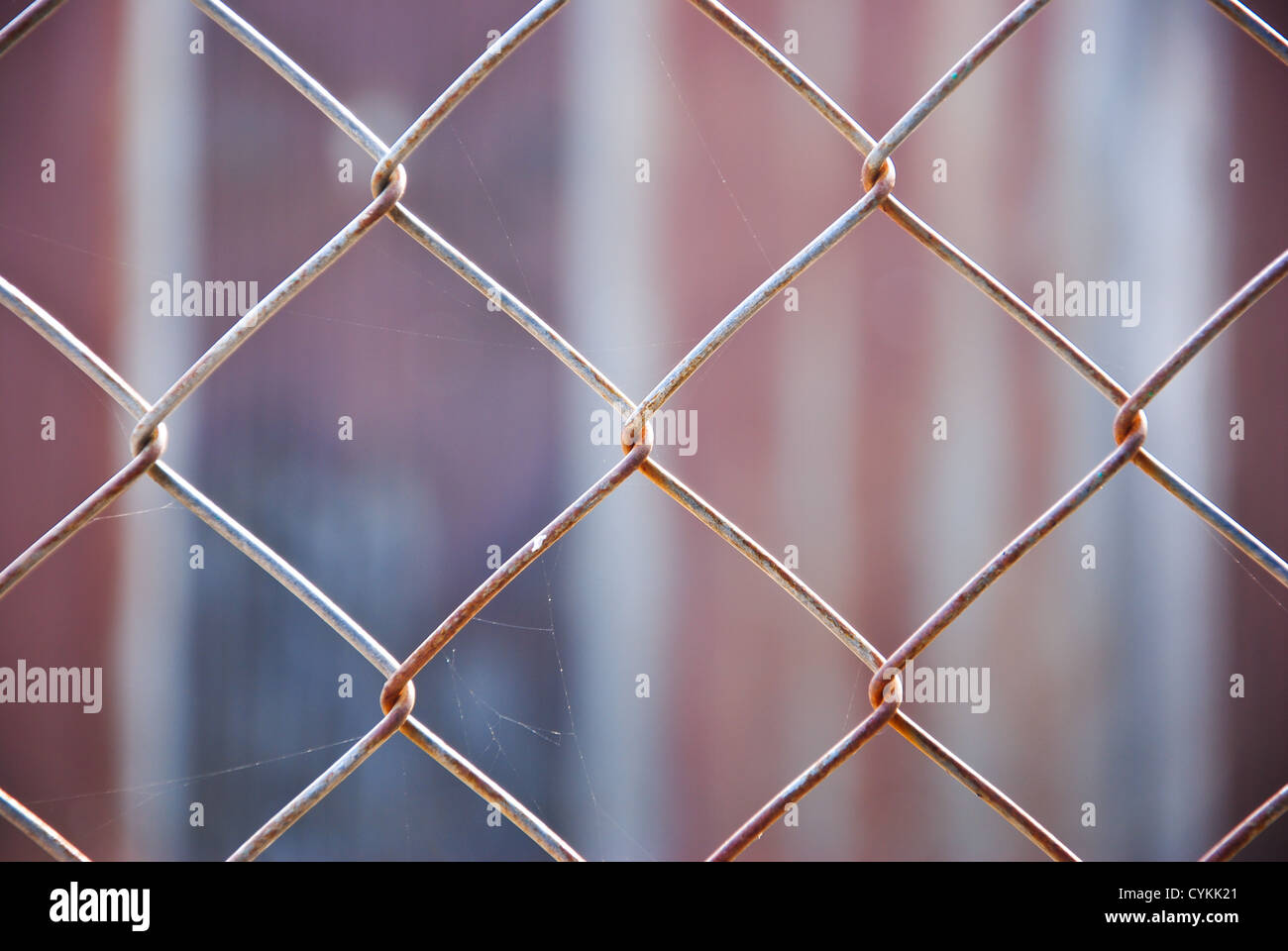 Mesh fence abstract blue background Stock Photo - Alamy