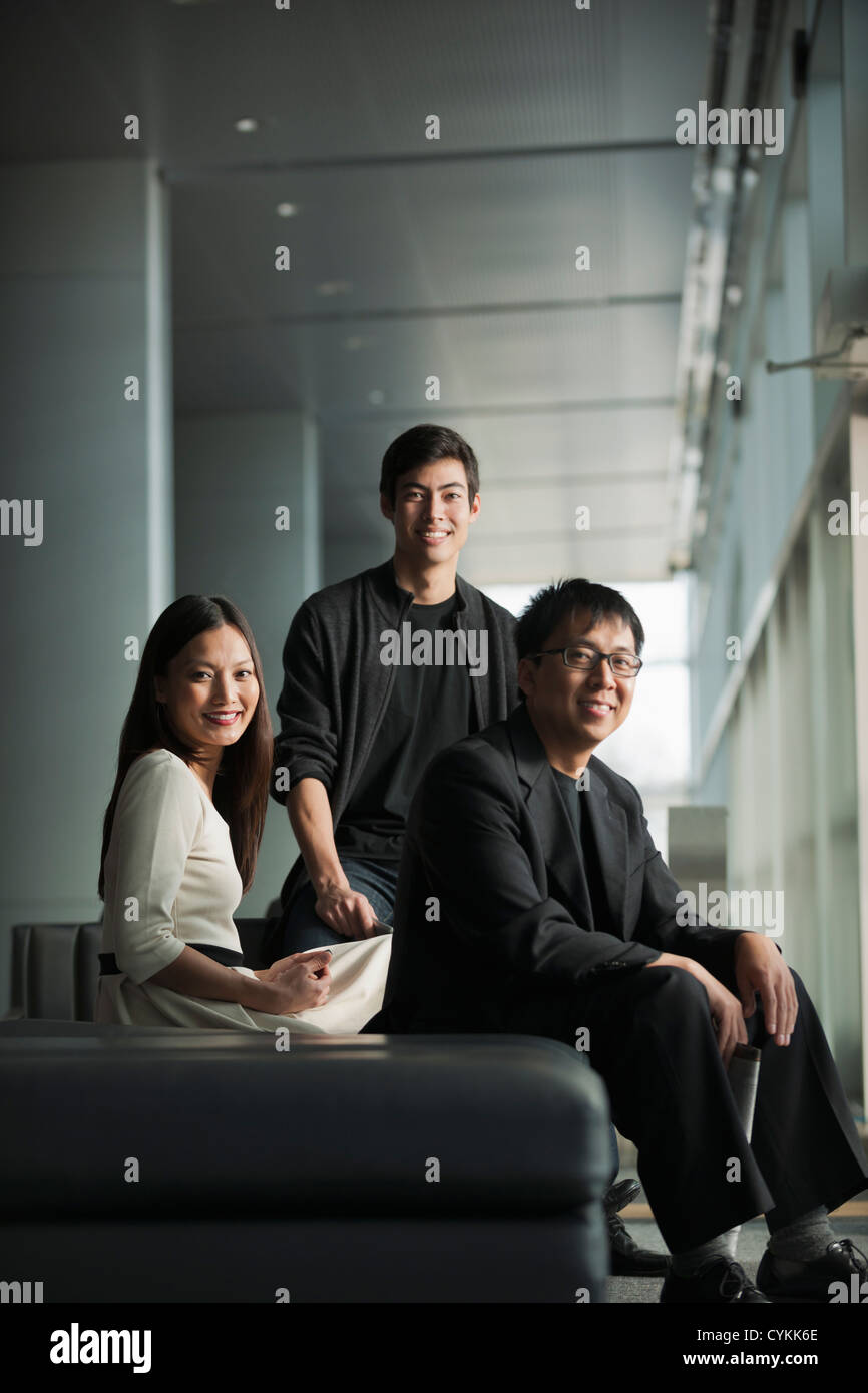 Business people sitting together Stock Photo - Alamy