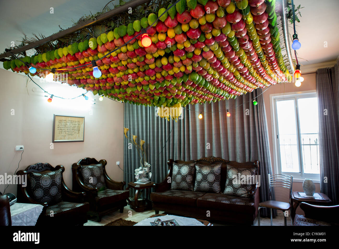 Samaritan indoor Sukkah is decorated with fresh fruit on the ceiling ...