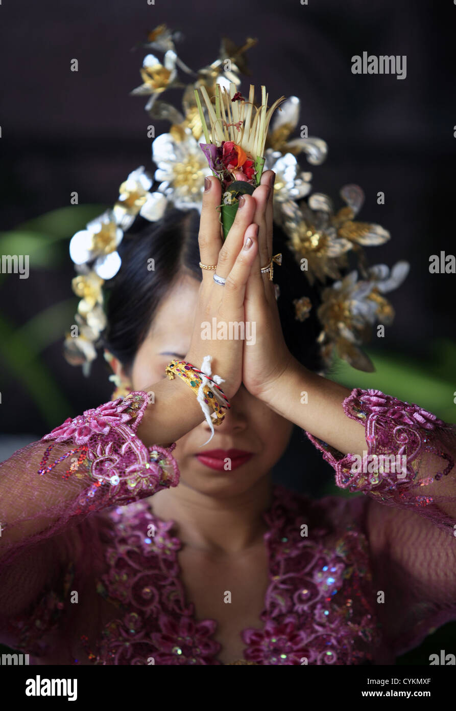 The Indonesian bride prays. Bali. Indonesia Stock Photo - Alamy