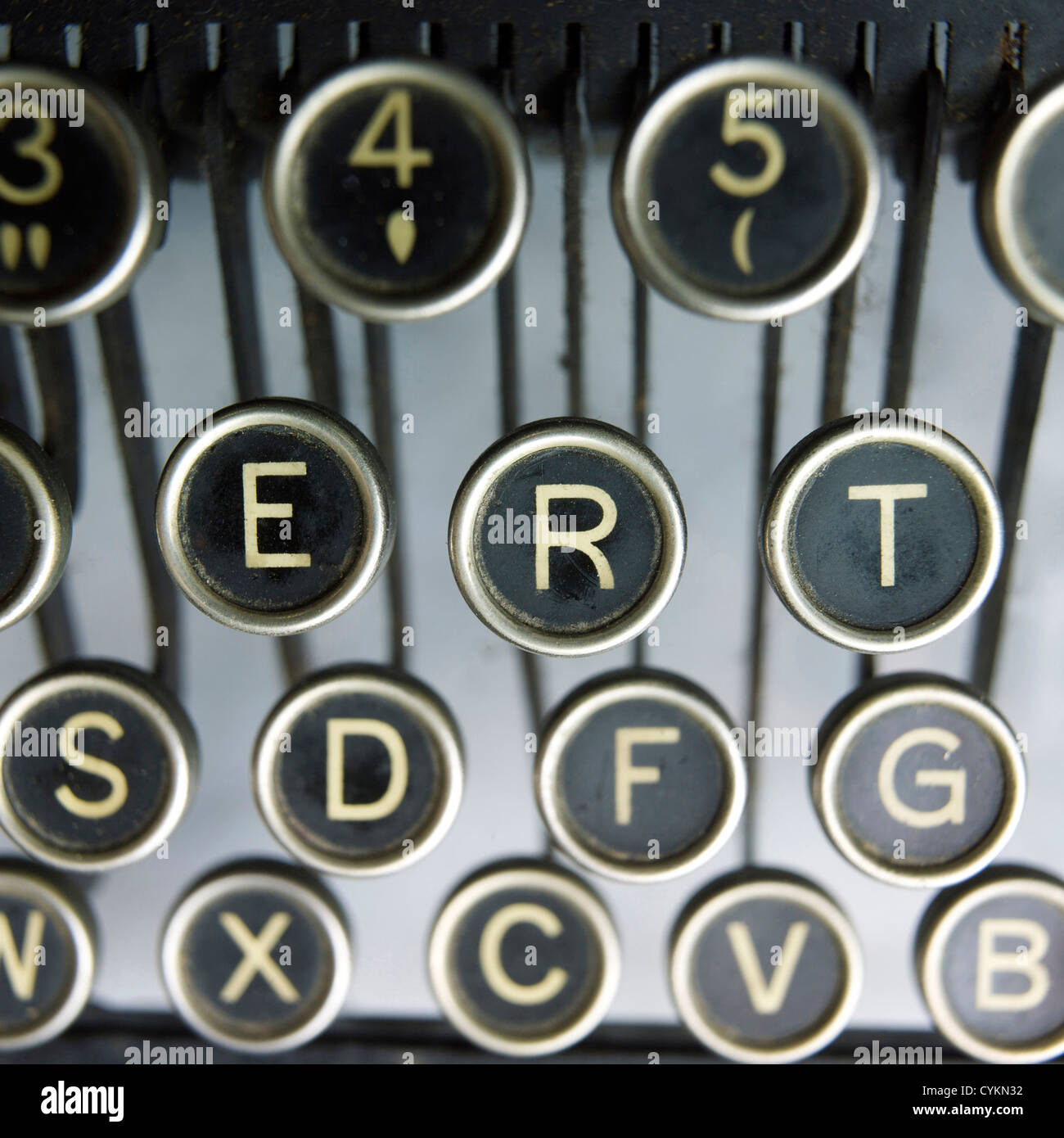 Vintage typewriter keys close-up showing metal buttons and numbers for ...