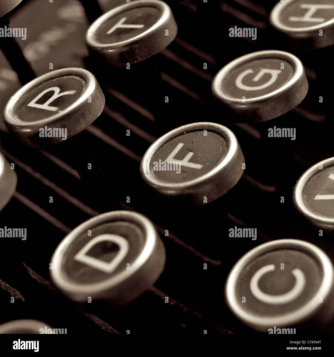Vintage typewriter keys close-up showing metal buttons and numbers for ...
