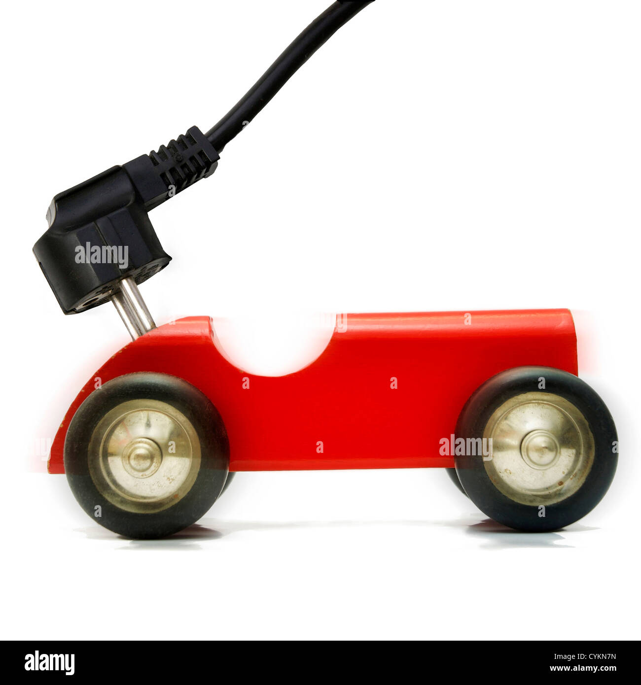 Toy vehicle plugged in and charging using electricity plug concept ...