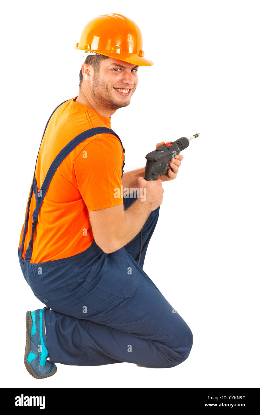 Happy worker with drill isolated on white background Stock Photo - Alamy