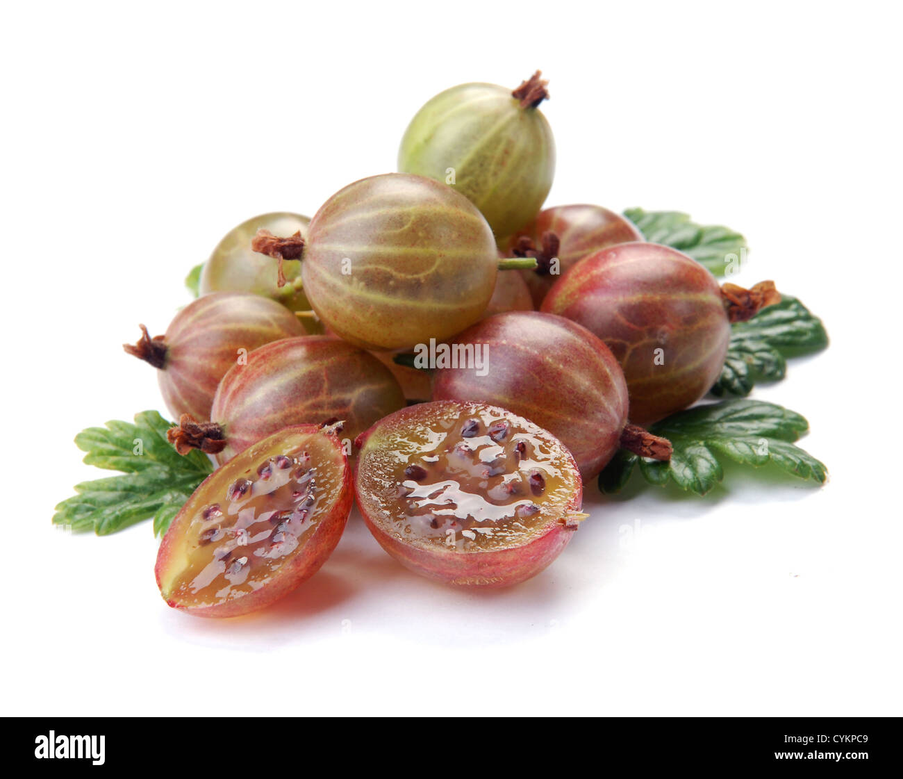 Ripe gooseberry with halves on a white background Stock Photo - Alamy
