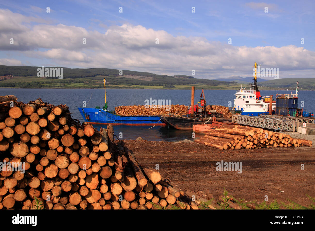 UK Scotland Isle of Mull loading timber onto ship Stock Photo - Alamy