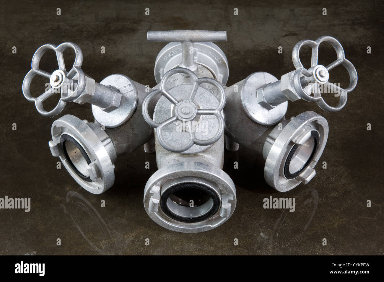 A firecock on the wet floor in a firestation used by firefighters Stock ...