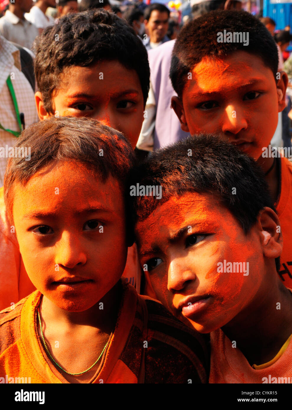 Nepali boys covered in orange powder at the bisket jatra festival in ...