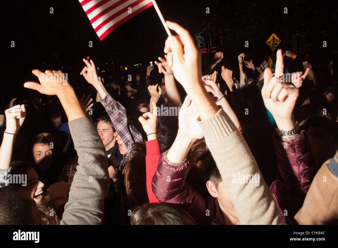 Seattle, USA. 7th November, 2012. People dance during an election party ...